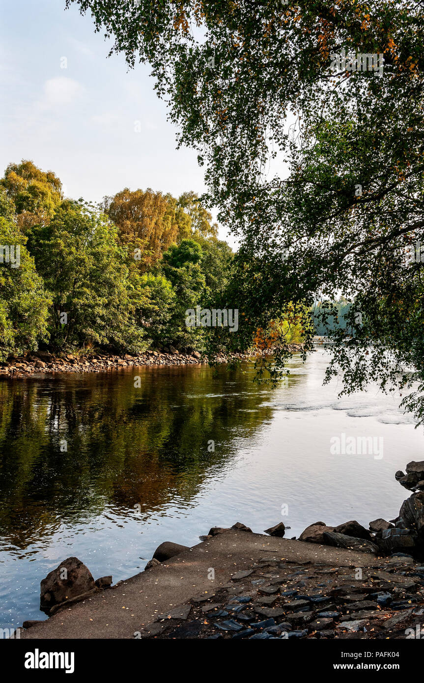 Rocks and river with reflections in a forest hi-res stock photography ...