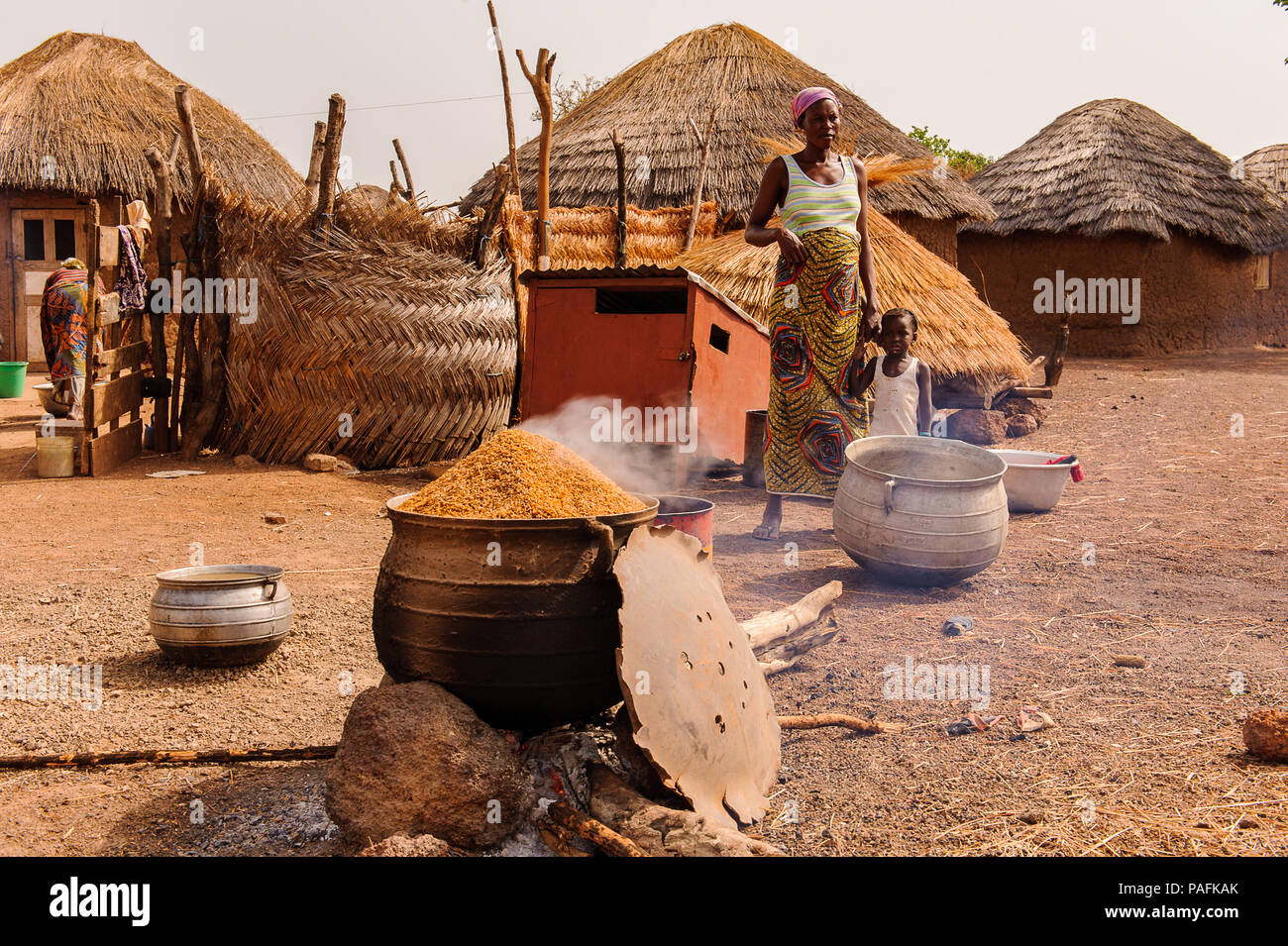 ACCRA, GHANA - MARCH 6, 2012: Unidentified Ghanaian woman near her ...