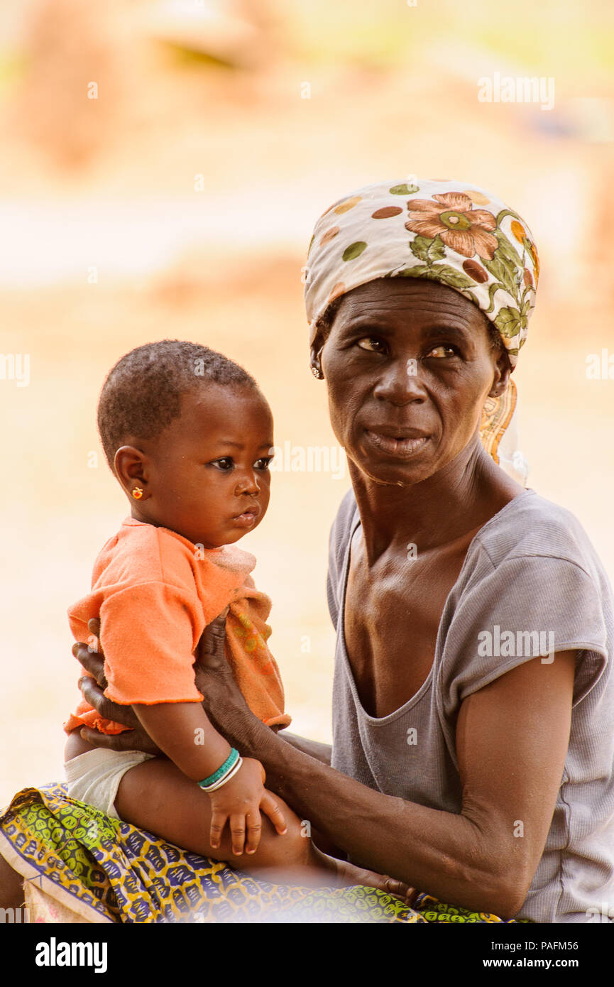 ACCRA, GHANA - MARCH 6, 2012: Unidentified Ghanaian mother and her ...
