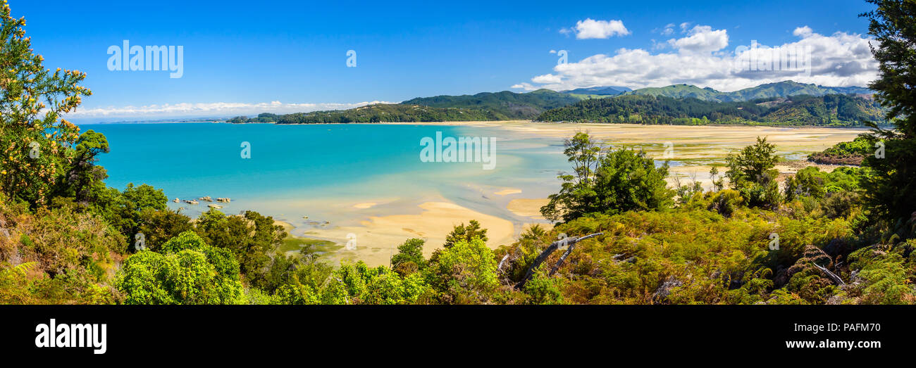 Panoramic image looking across Sandy Bay towards Marahau on the Abel ...