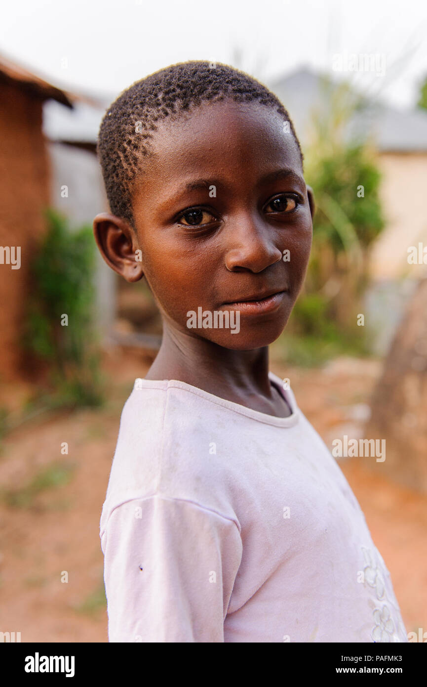 ACCRA, GHANA - MARCH 6, 2012: Unidentified Ghanaian boy in the street ...