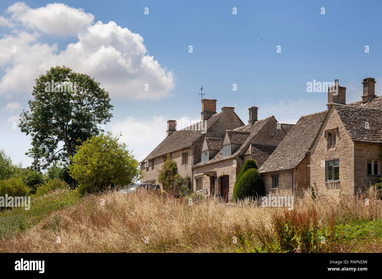 Cotswold village of Little Barrington, Gloucestershire, England Stock ...
