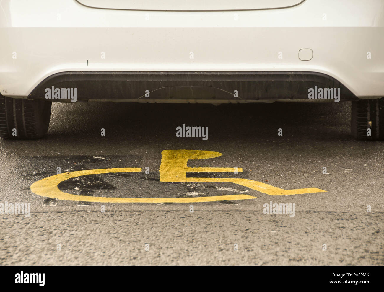 Car parked in disabled parking bay with disabled logo visible on the ...