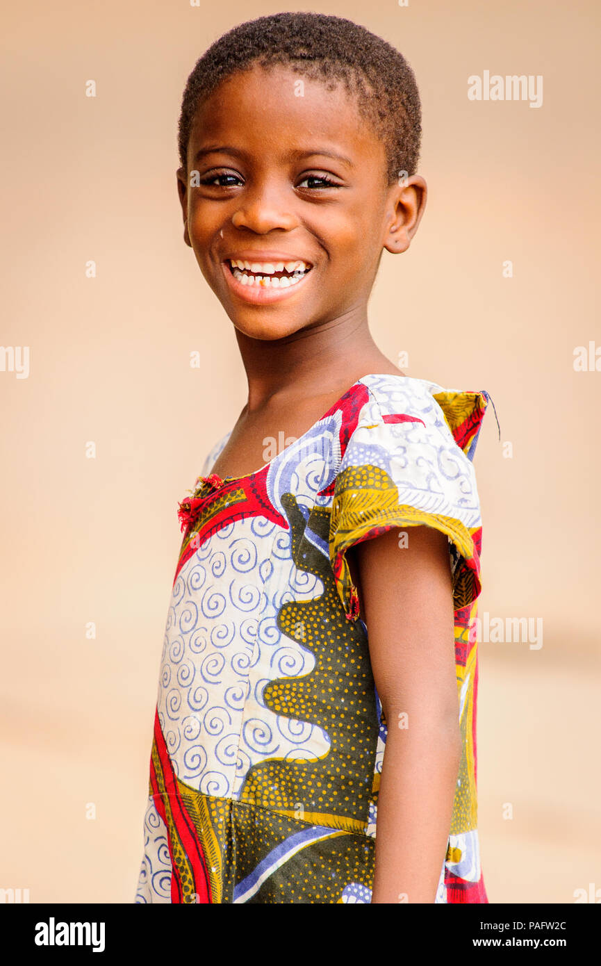 PORTO-NOVO, BENIN - MAR 10, 2012: Unidentified Beninese smiling girl in ...