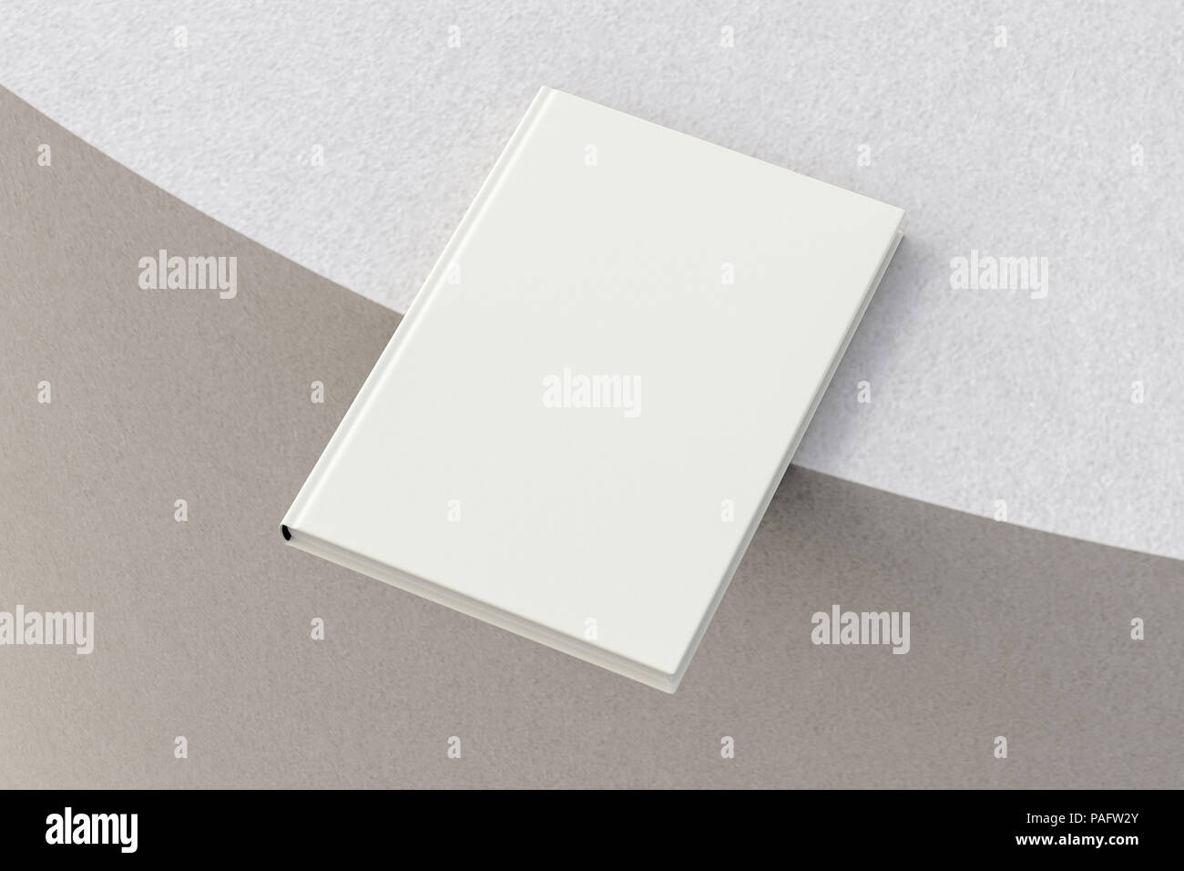 Blank vertical book on the edge. Isolated with clipping path around ...