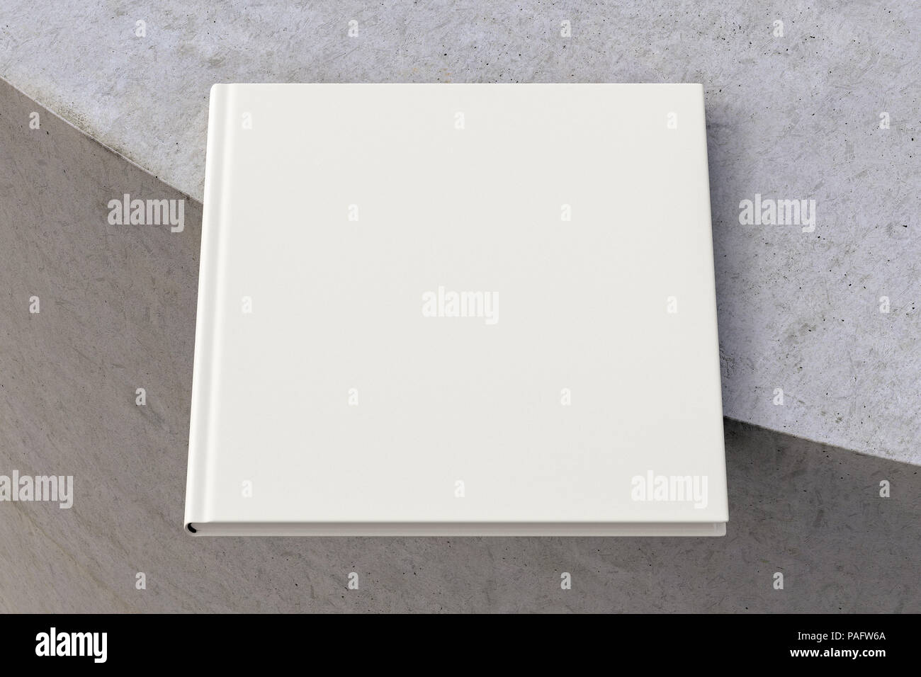 Blank square book on the edge. Isolated with clipping path around book ...