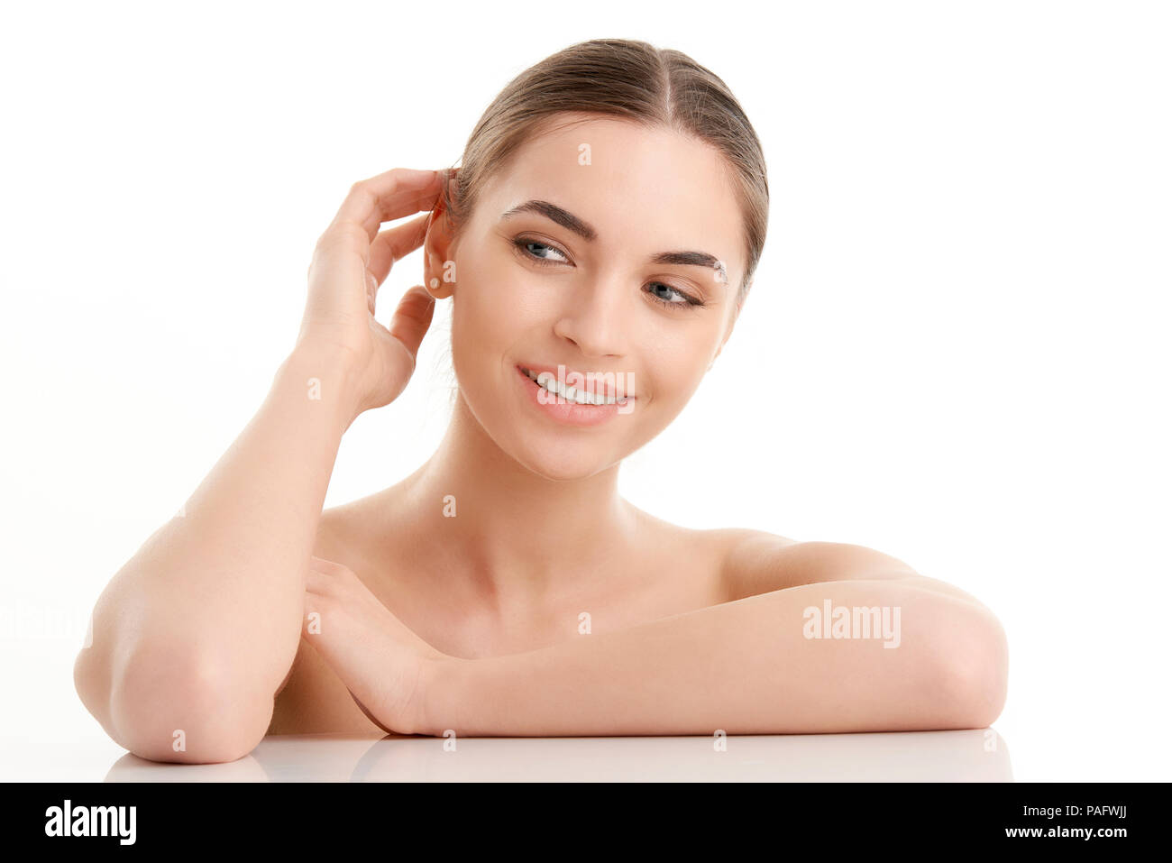Close-up portrait of beautiful woman with perfect skin posing at ...