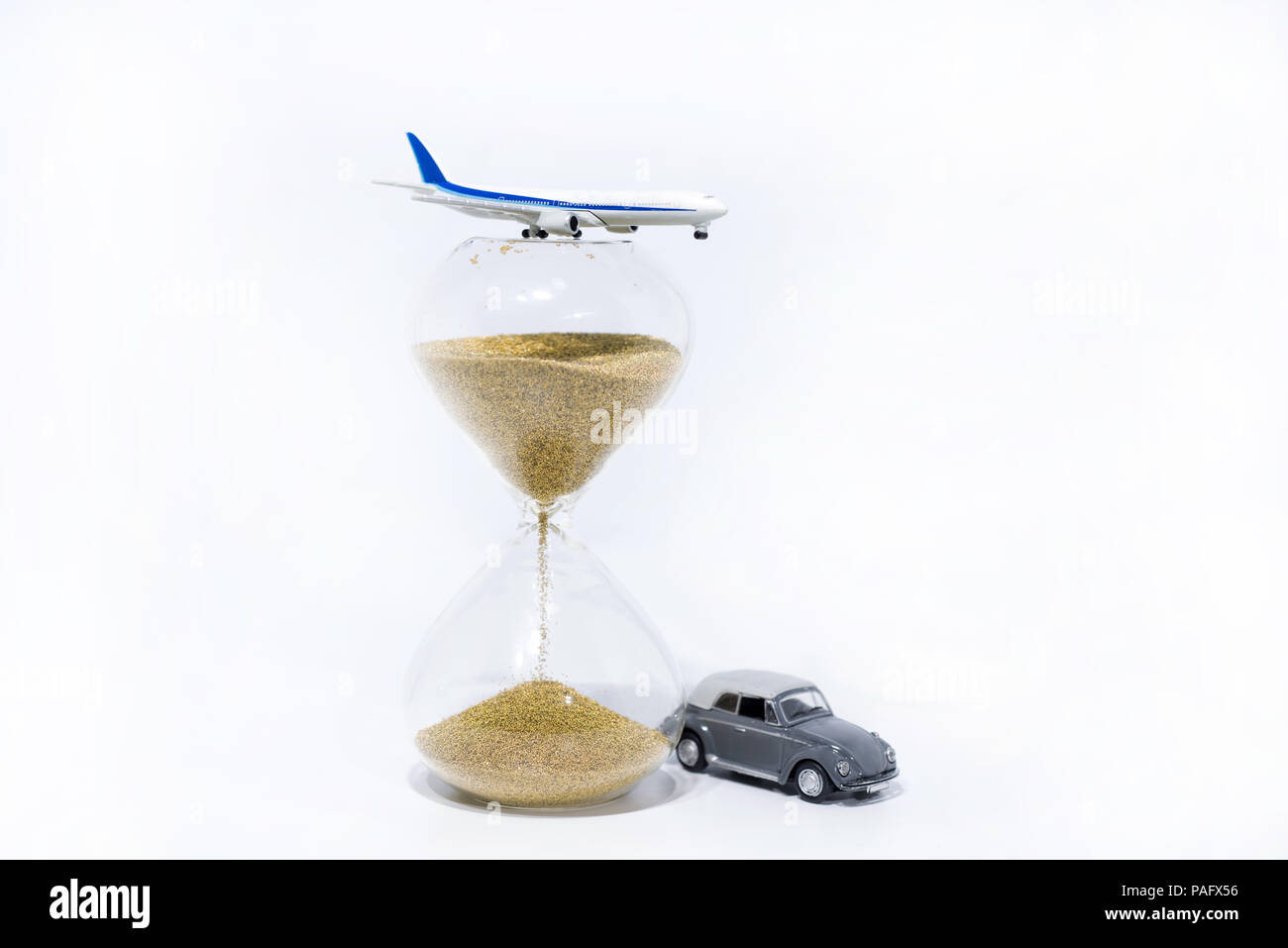 Abstract comparison of travel. Plane and car model isolated on white ...