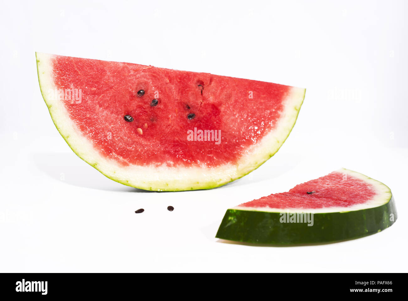Isolated slices of Watermelon. The biggest berry Stock Photo - Alamy