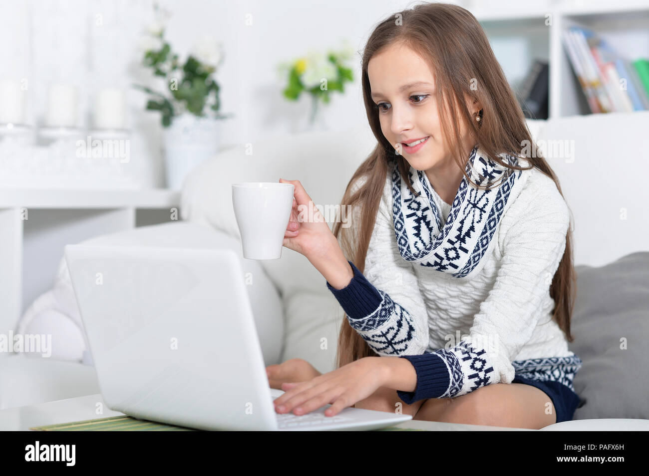 little girl using modern laptop Stock Photo - Alamy