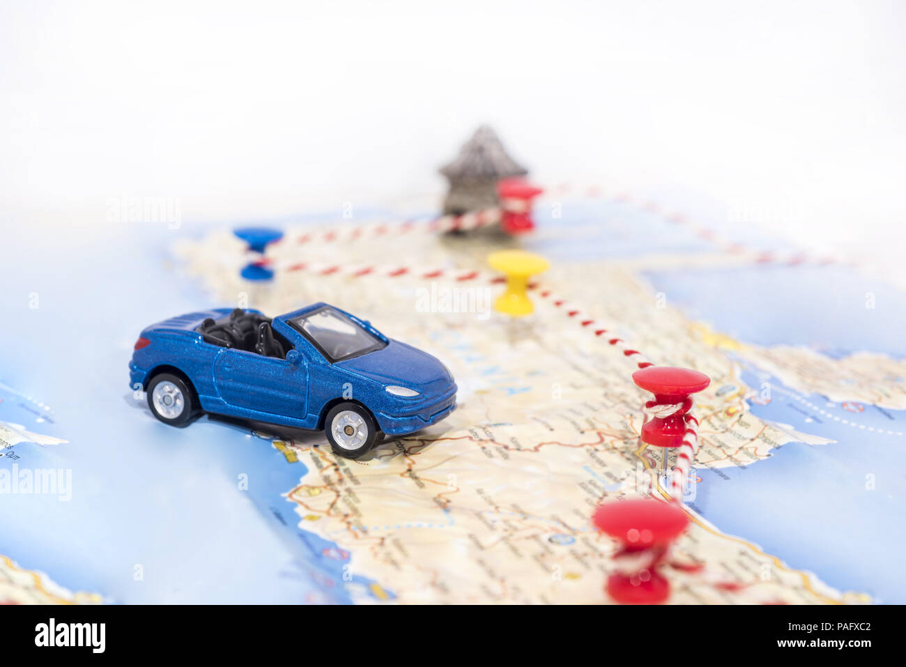 Abstract idea of rent a car. Small car on map. Abstract travel photo ...