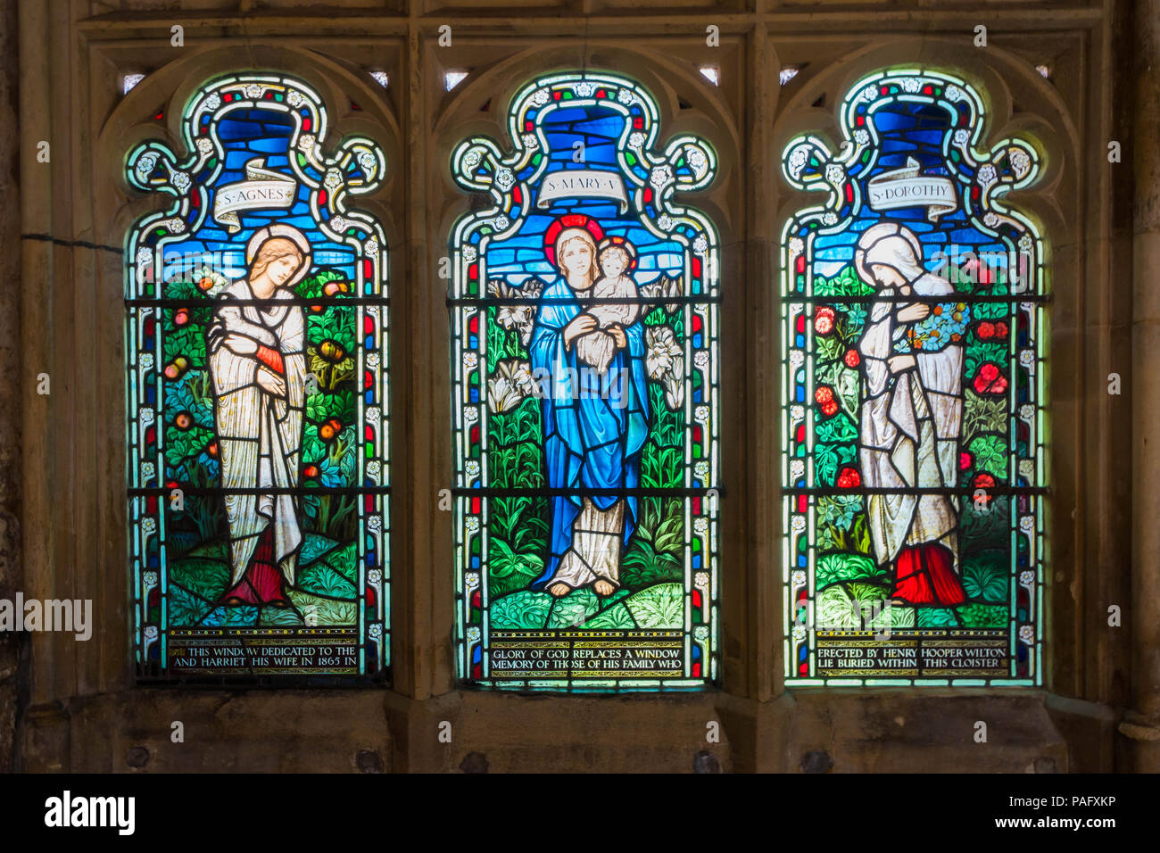 Stained glass depicting St Agnes, St Mary and St Dorothy. The Cloister ...