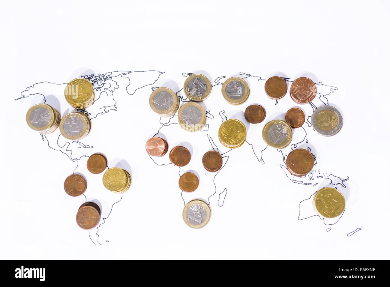 A lot of coins on World Map. Abstract photo of world economy Stock ...