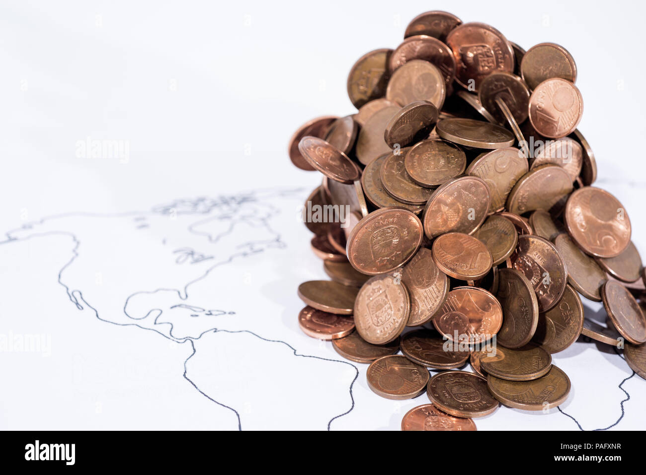 A lot of coins on World Map. Abstract photo of world economy Stock ...