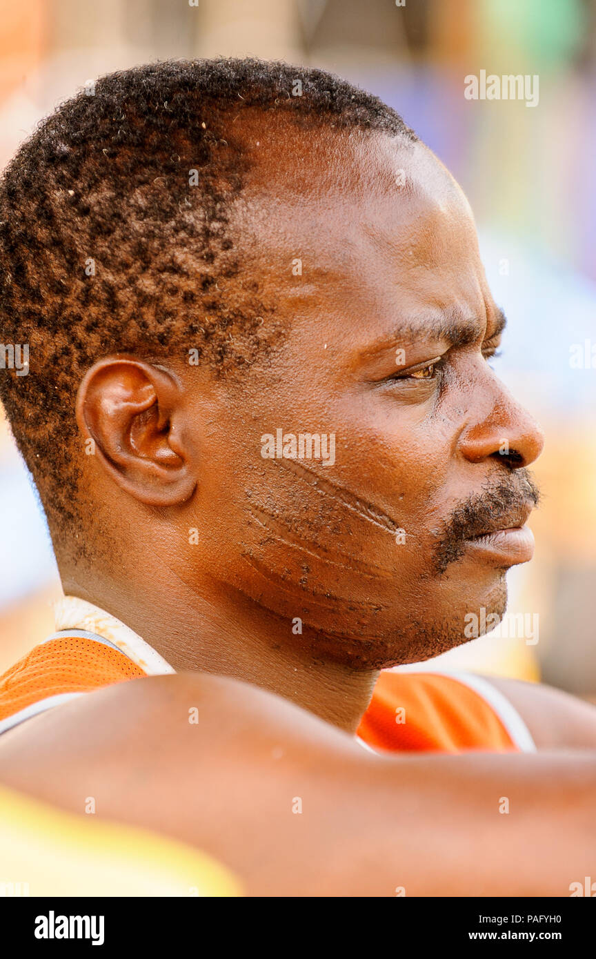 KARA, TOGO - MARCH 11, 2012: Unidentified Togolese man with three scars ...
