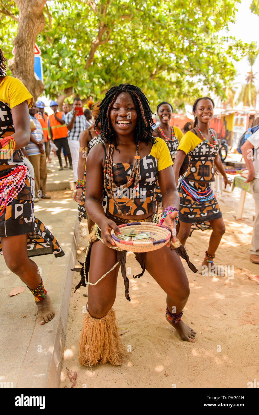 ANGOLA, LUANDA - MARCH 4, 2013: Smiling Angolan woman dances the local ...