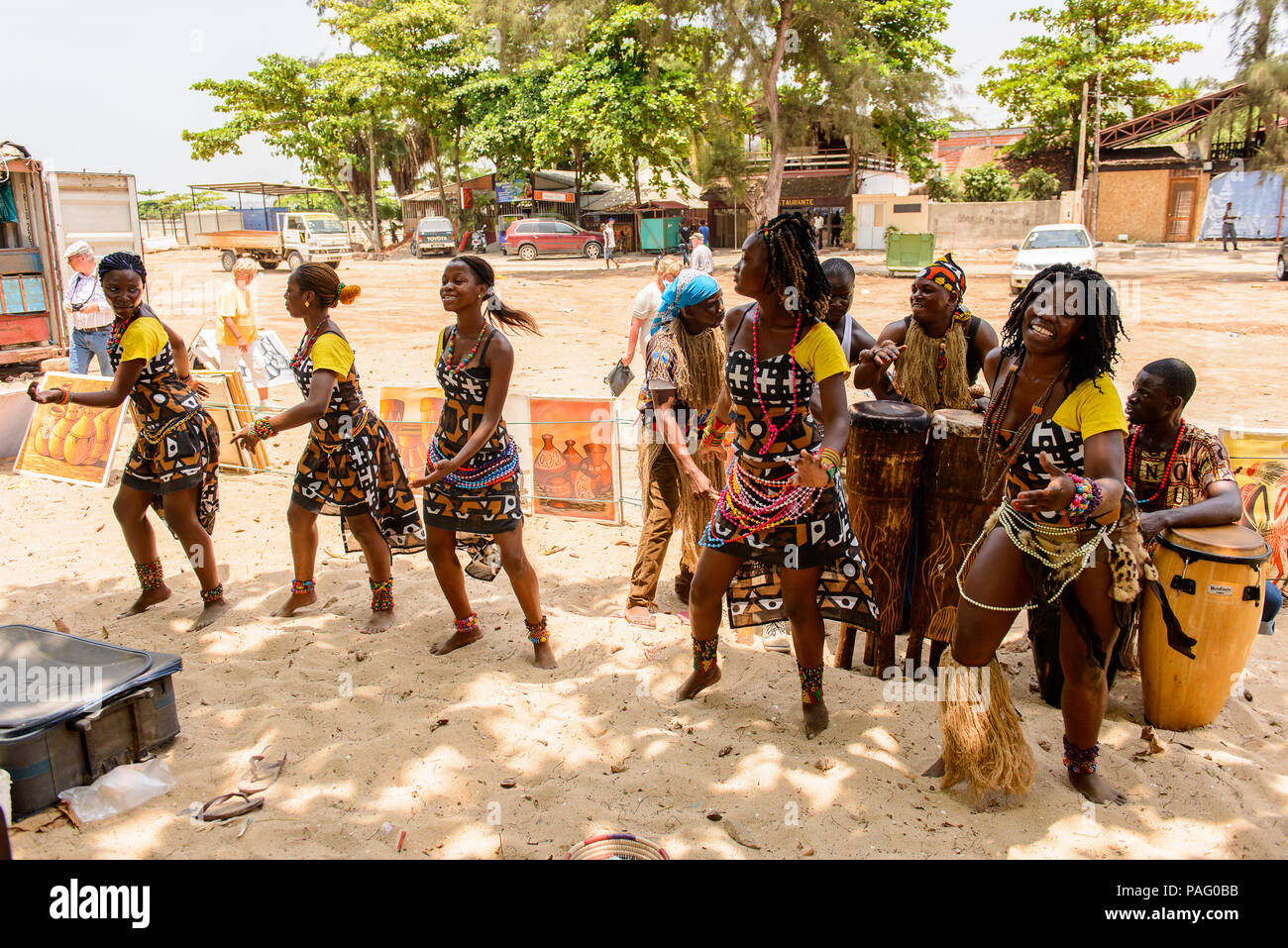 ANGOLA, LUANDA - MARCH 4, 2013: Unidentified Angolan women make the street performance of the ...