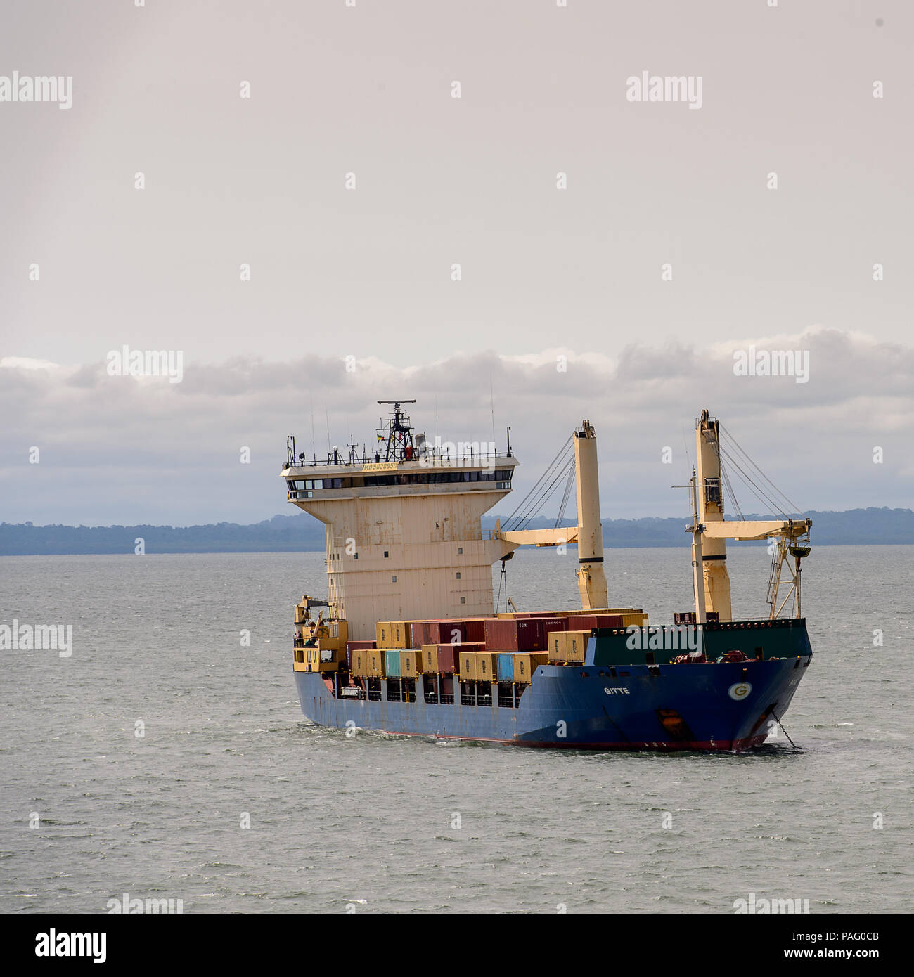LIBREVILLE, GABON - MAR 6, 2013: Cargo ship near the port of Libreville ...