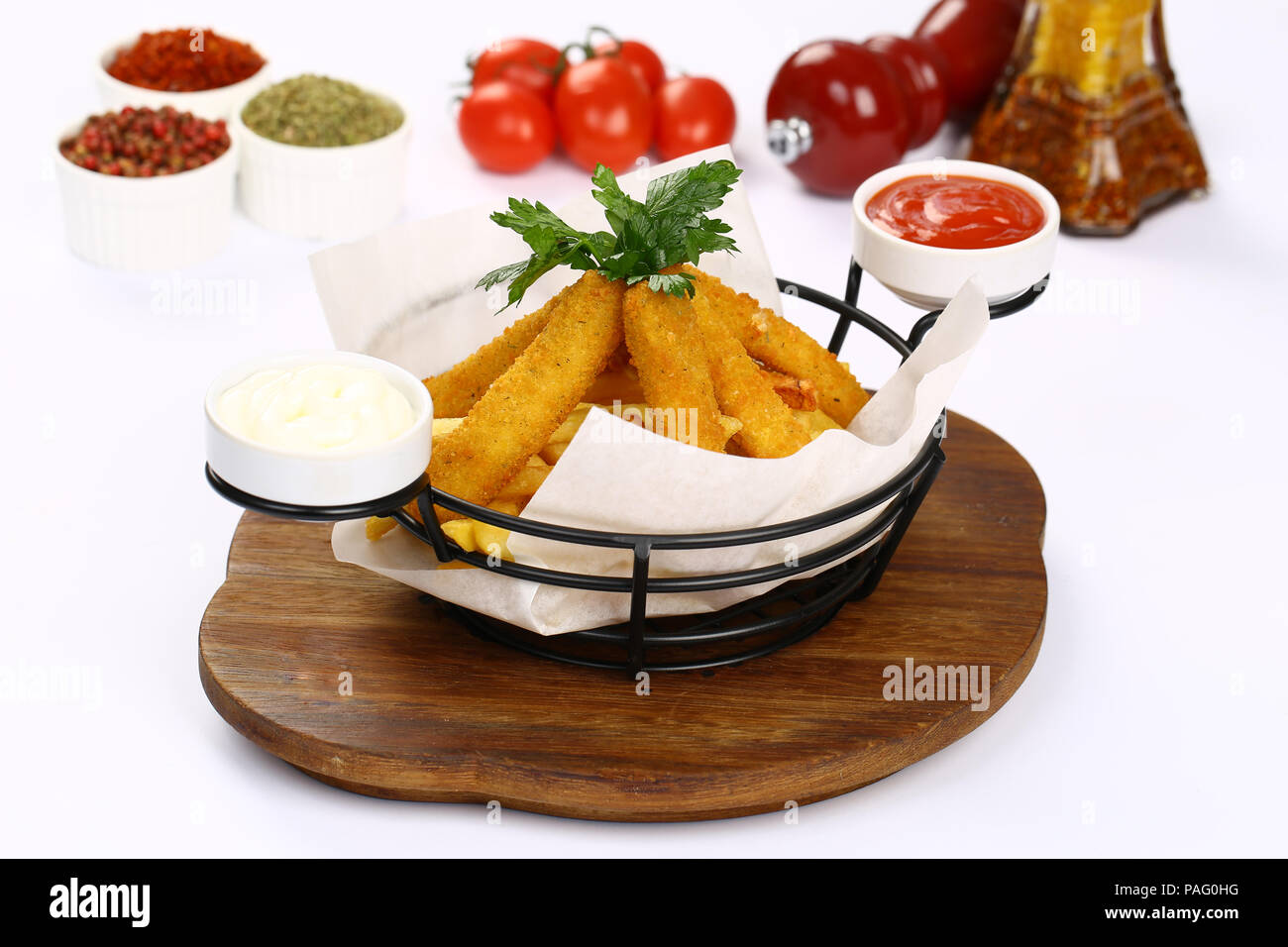 Mixed appetizer of french fries, fried sasusage, fried zucchini, pastry ...