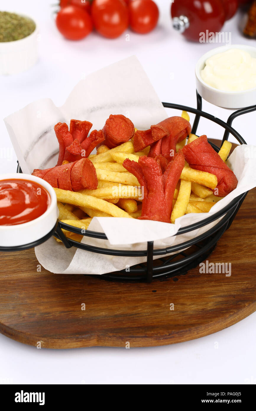 Fried sausage and french fries with sauce Stock Photo - Alamy