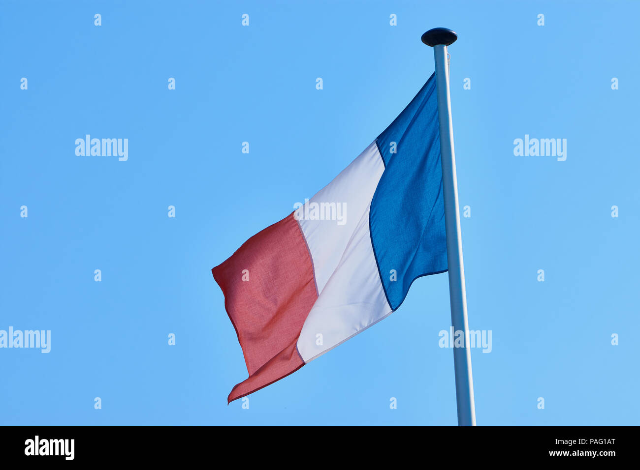 Flag france pole waving hi-res stock photography and images - Alamy