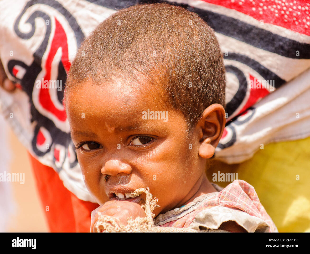 KENYA - OCTOBER 10, 2009: Unidentified Massai little shy baby girl ...