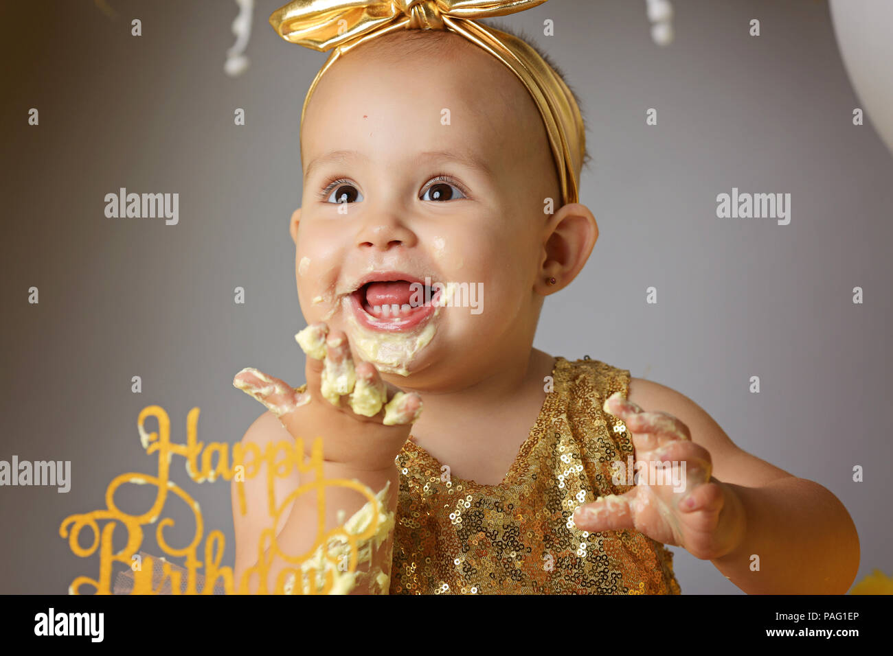 The first cake baby. Portrait of a child. Cake Smash Stock Photo - Alamy