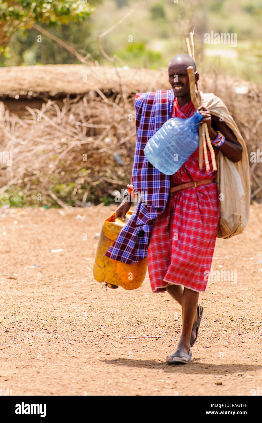 AMBOSELI, KENYA - OCTOBER 10, 2009: Unidentified Massai man walks ...