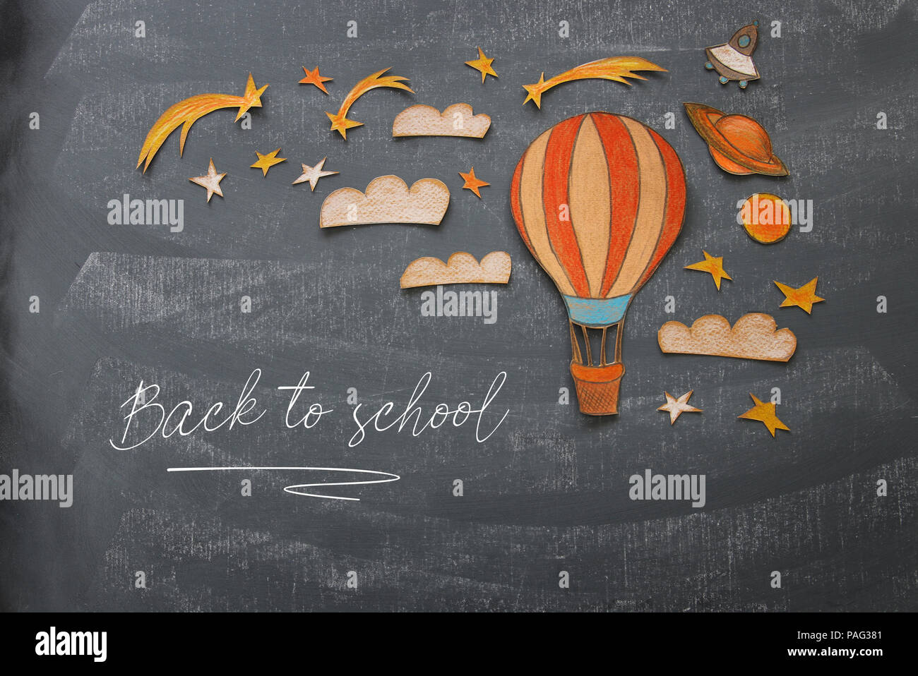Back to school concept. Hot air balloon, space elements shapes cut from ...