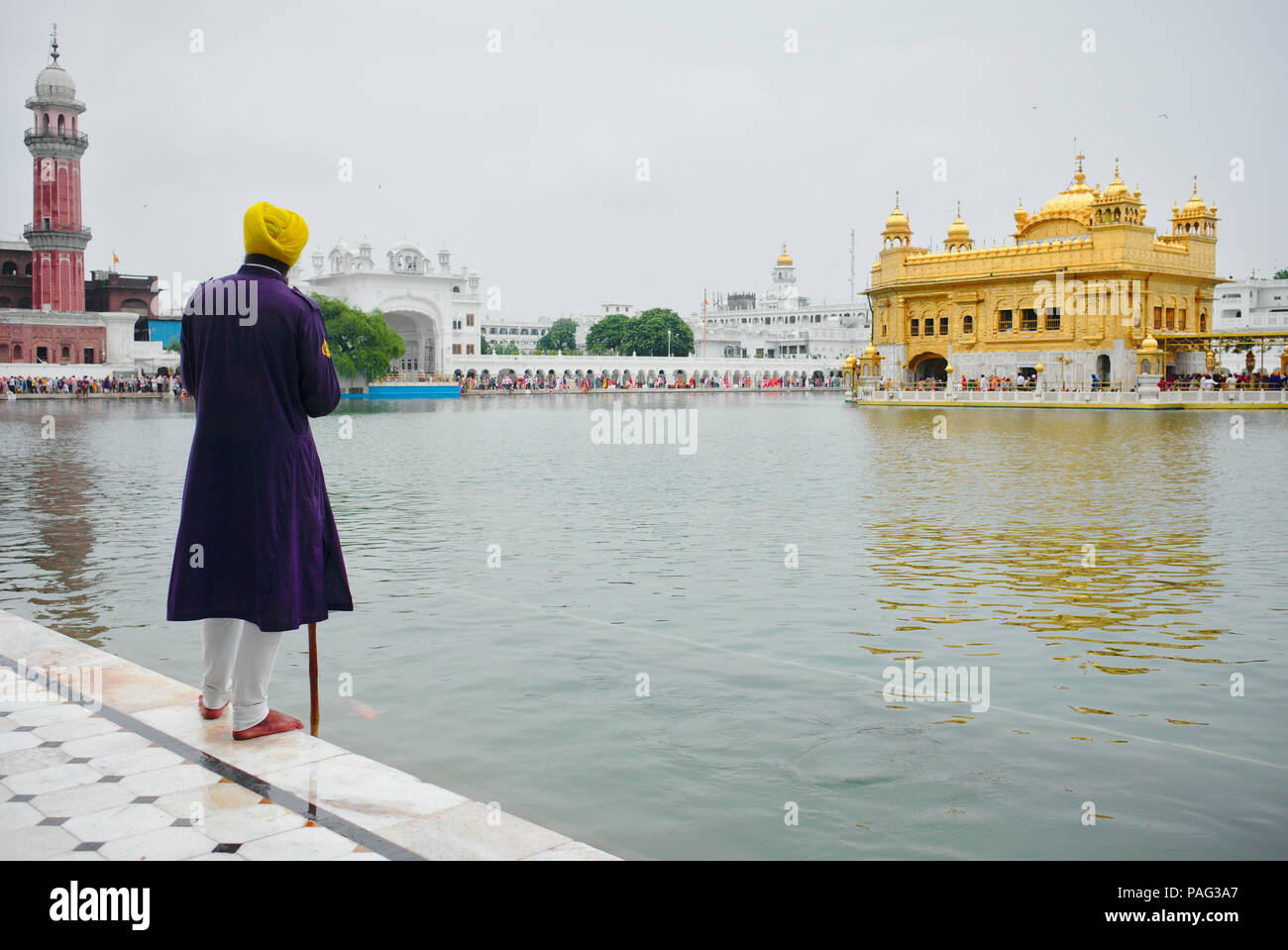 Guard men at the Golden Temple, monitoring visitors and ensuring sacred ...