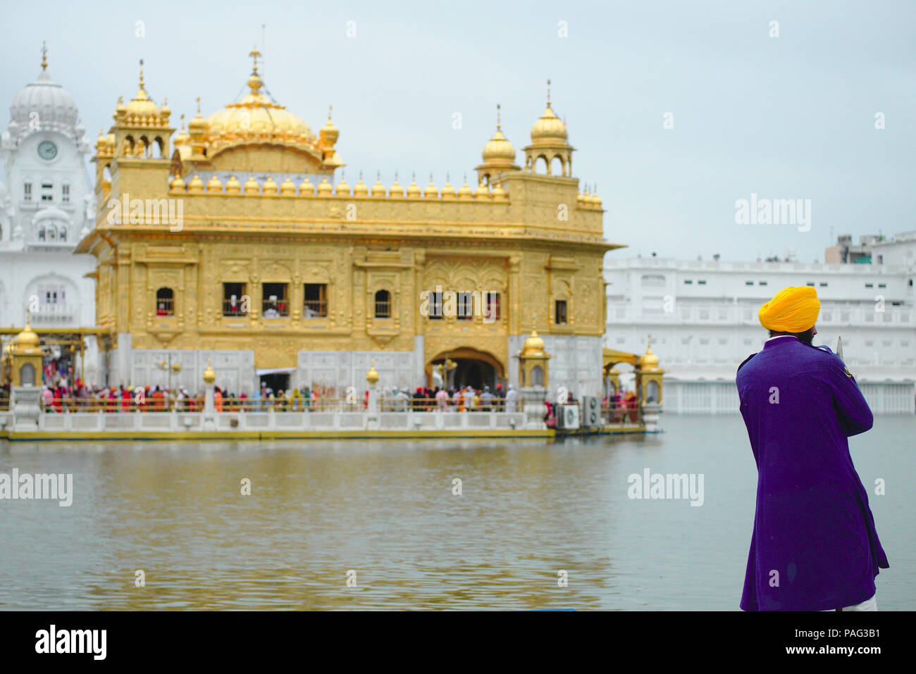 Guard men at the Golden Temple, monitoring visitors and ensuring sacred ...