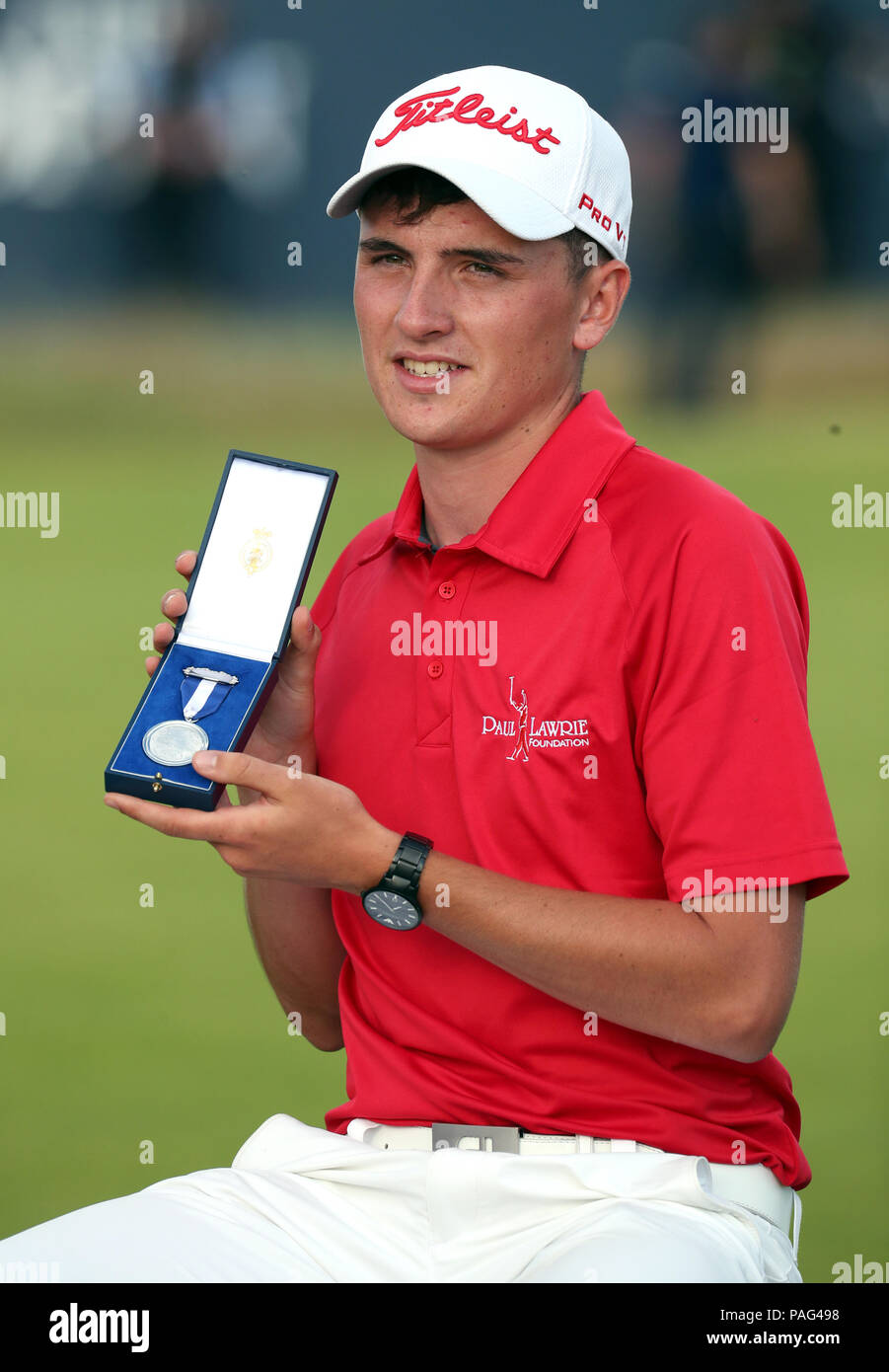 Scotland's Sam Locke with the silver medal for best amateur during day ...