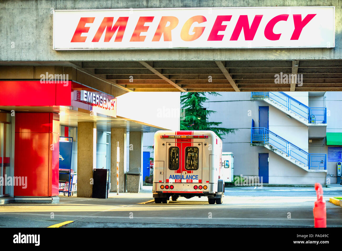 Ambulance car in front of emergency entrance. A modern ambulance car ...