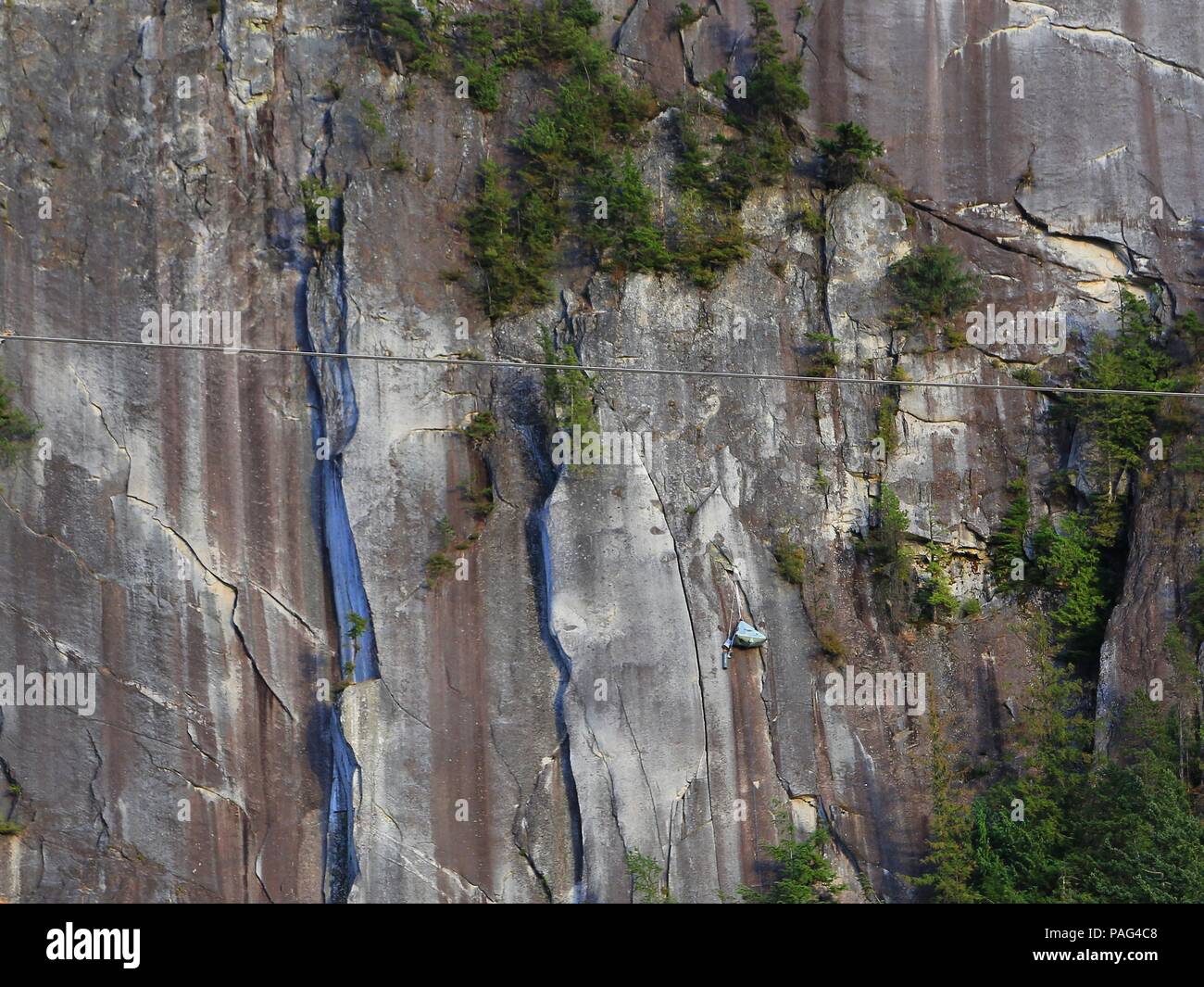 Hanging by a Thread Stock Photo - Alamy