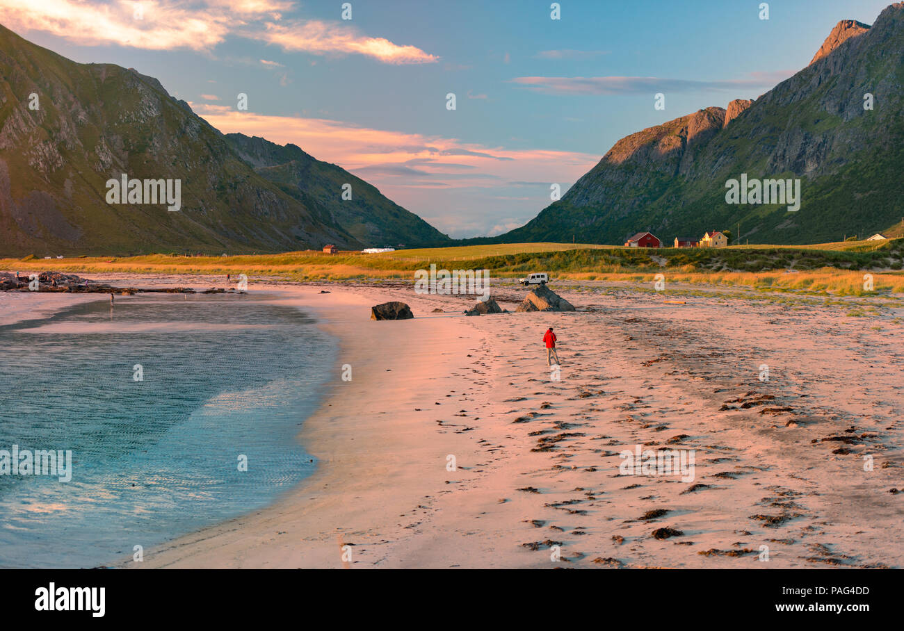 Landscape at sunset with beach and mountains. Purple sky in background ...