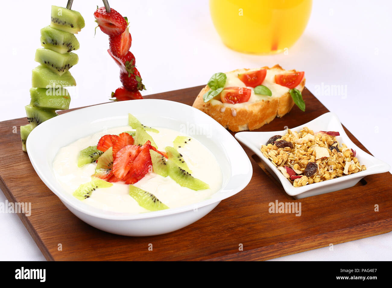 Bowl of fruity yogurt Stock Photo - Alamy