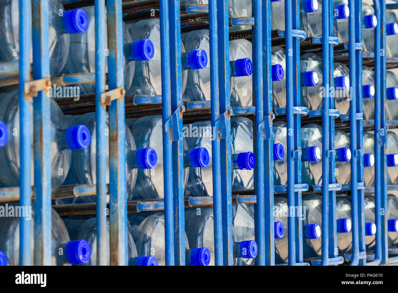 Rows of water bottles arranged in warehouse Stock Photo - Alamy