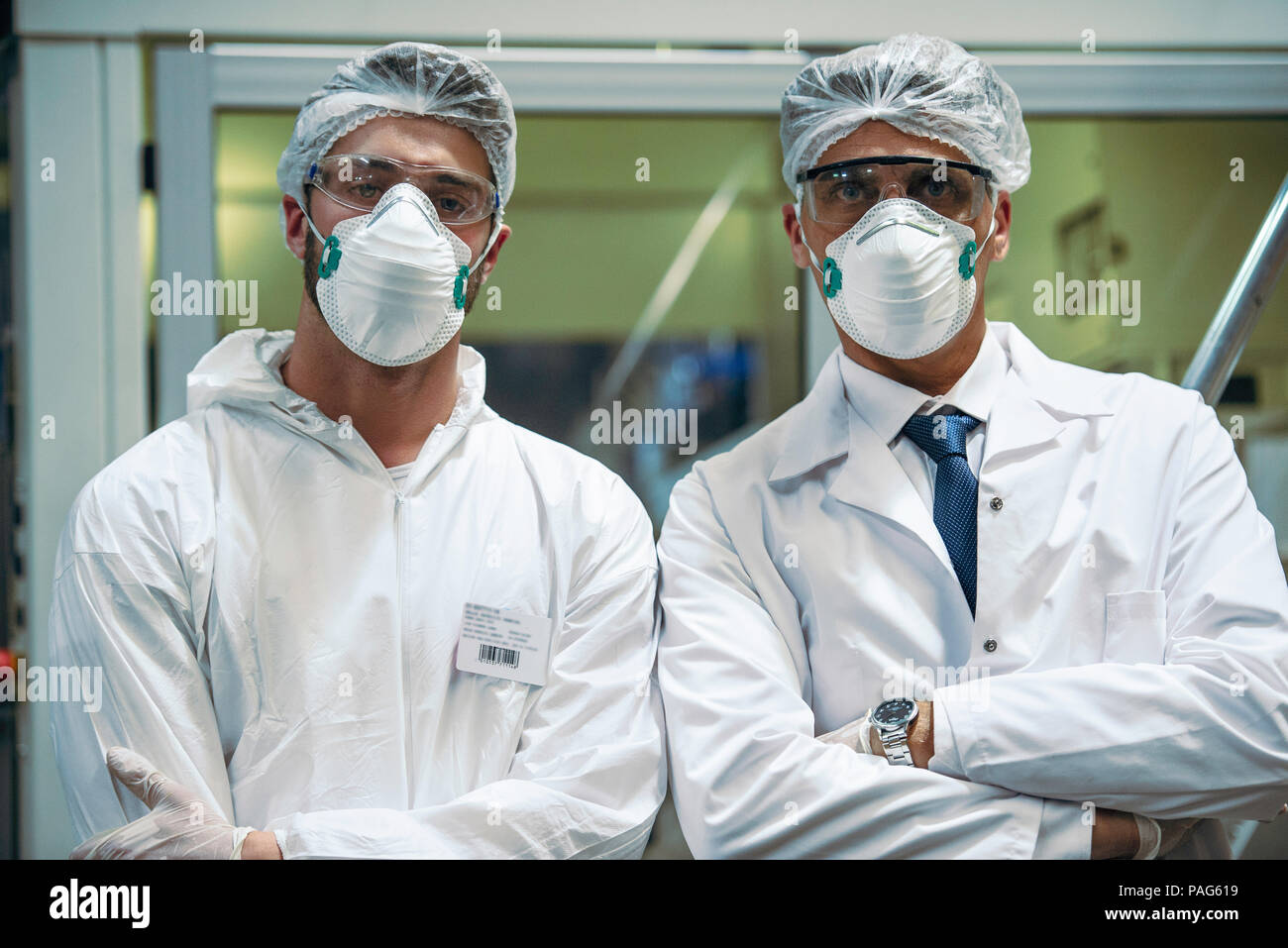Scientists standing together in laboratory Stock Photo - Alamy