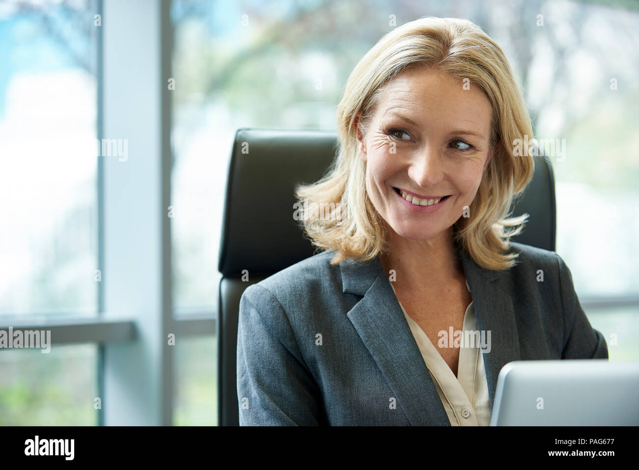 Smiling looking away authority close up hi-res stock photography and images - Alamy