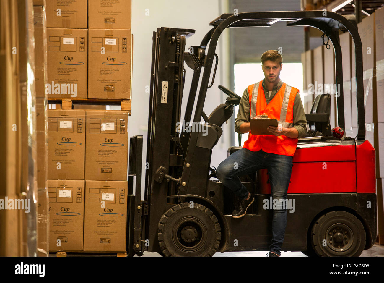 Worker standing warehouse hi-res stock photography and images - Alamy