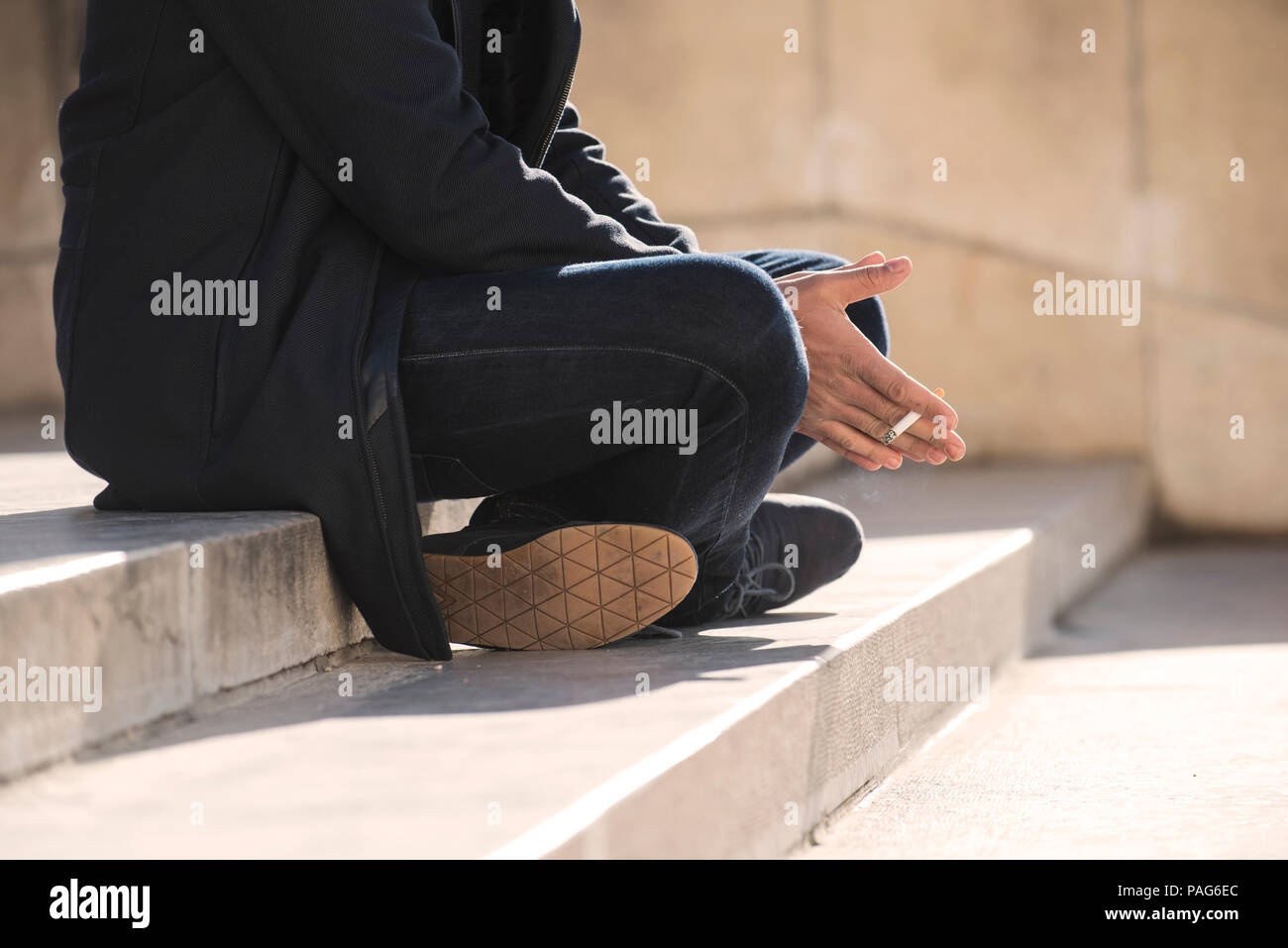 Sitting cross legged horizontal hi-res stock photography and images - Alamy