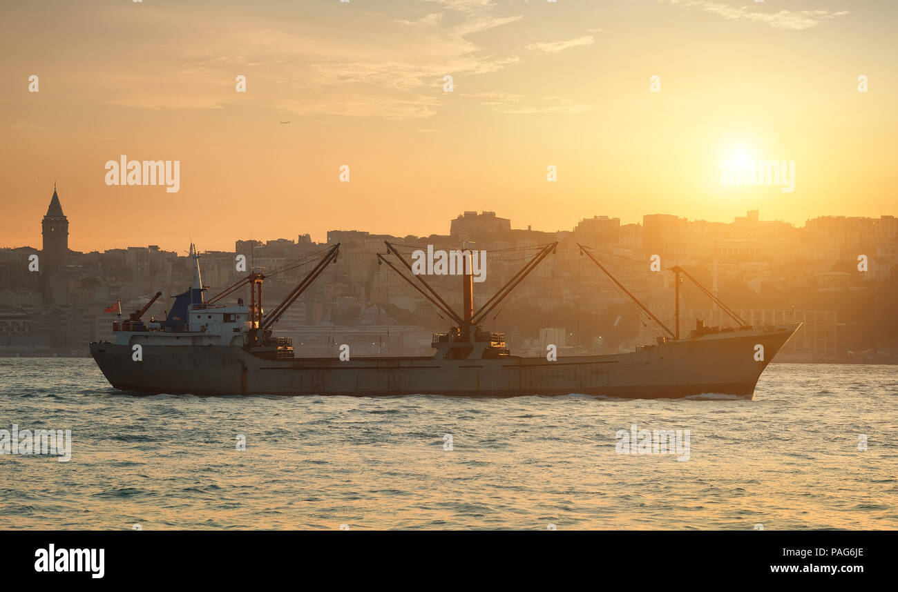 Cargo ship in Istanbul at sunset, Turkey Stock Photo - Alamy