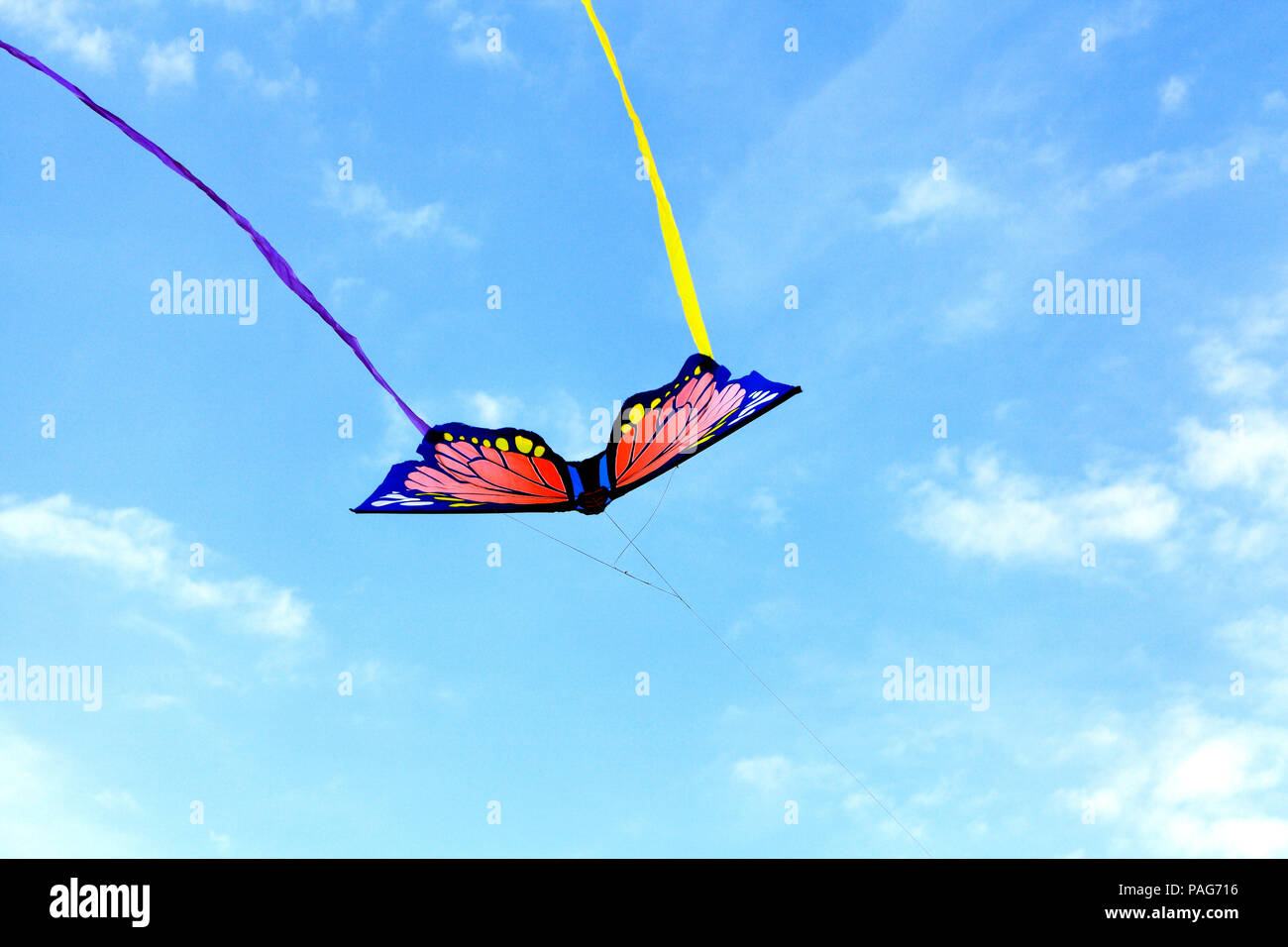 Flying Butterfly Kite, colourful, multi colours, streamers, blue sky ...