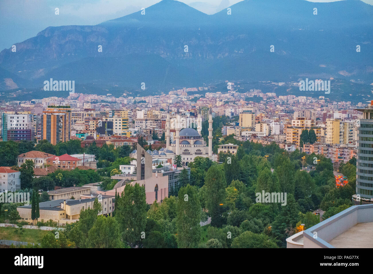 Areal cityscape view of Tirana city center at sunset. Modern ...