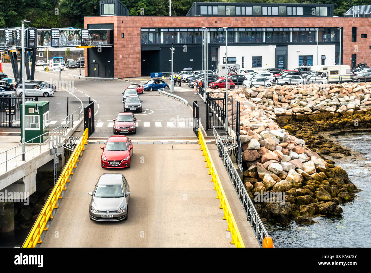 Cars embarking the MV Caledonian Isles at the new (2018) ferry terminal ...