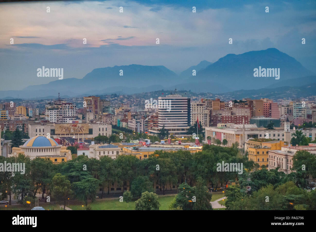 Areal cityscape view of Tirana city center at sunset. Modern ...