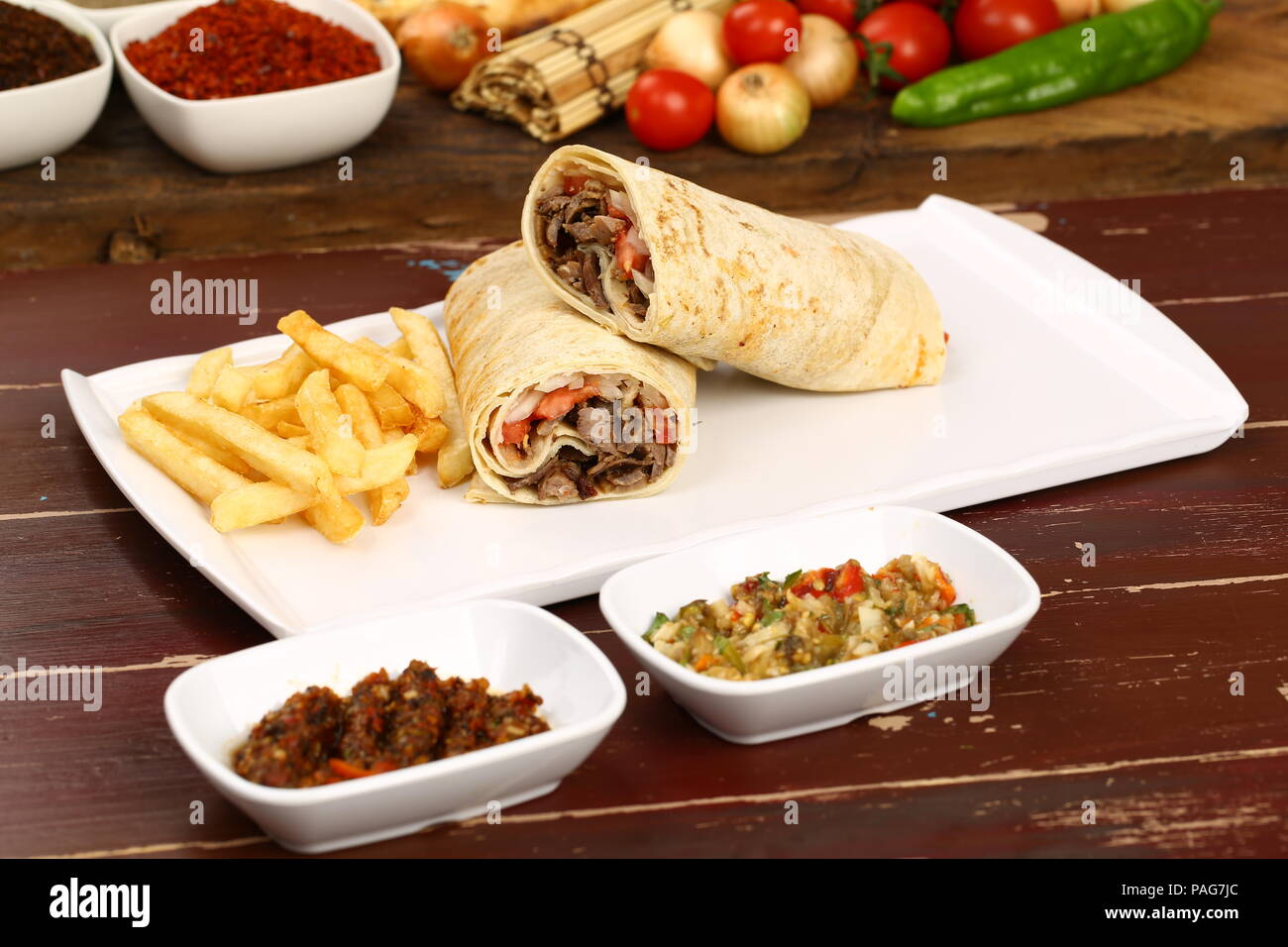 Tortilla wrap with meat and french fries. Turkish Shawarma Doner durum ...