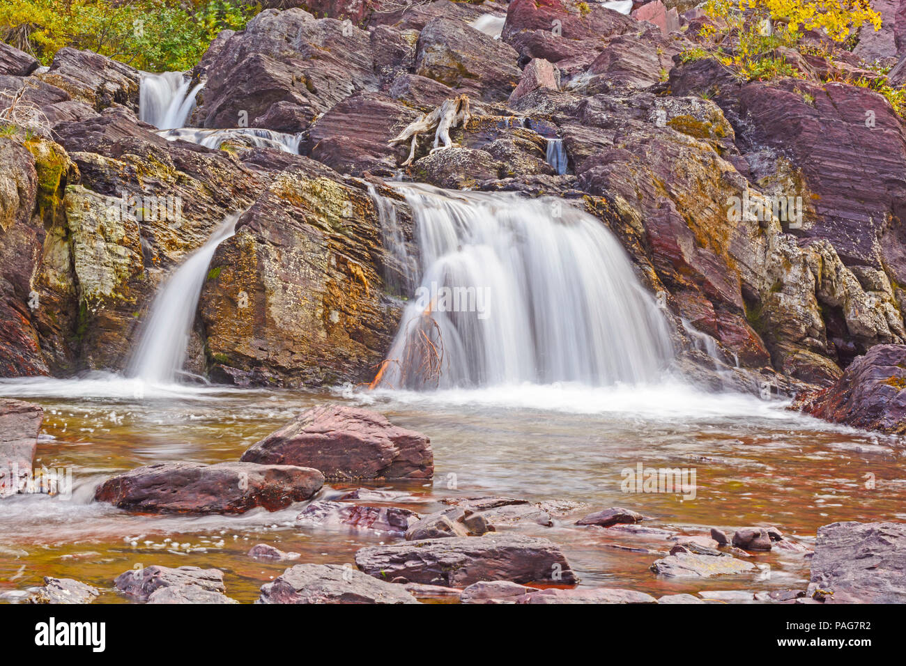 Red Rock Falls in Swiftcurrent Valley in Glacier National Park in ...