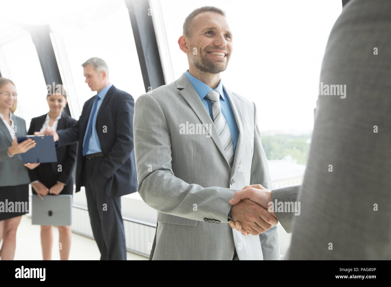 Happy office worker finishing work hi-res stock photography and images ...