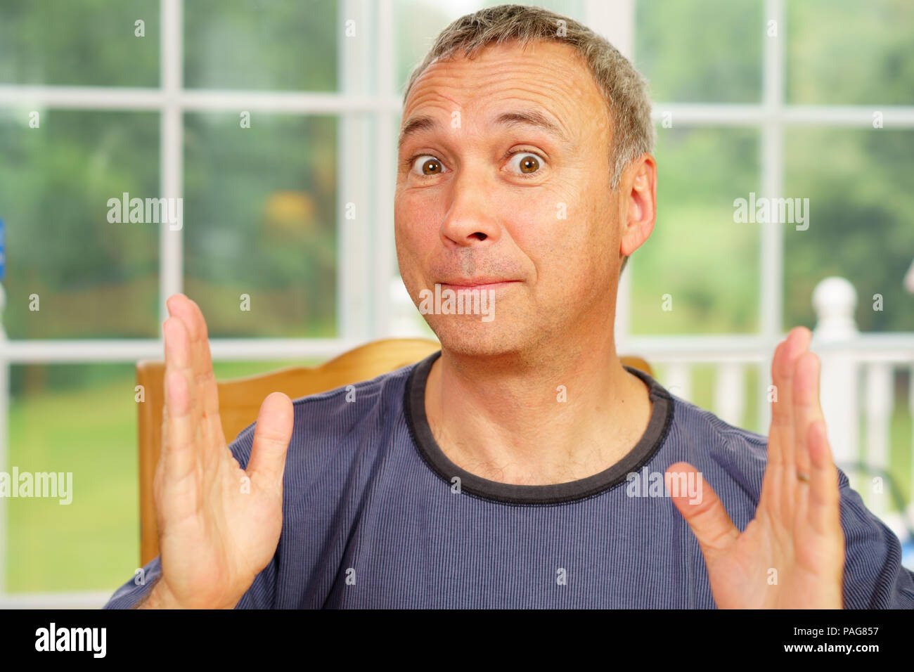 Mocking smile hi-res stock photography and images - Alamy